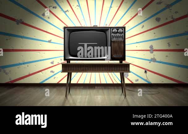 Retro TV receiver with green screen standing on a table, colorful burst ...