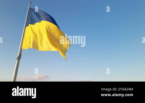 Highly detailed fabric texture flag of Ukraine. Slow motion of Ukraine ...