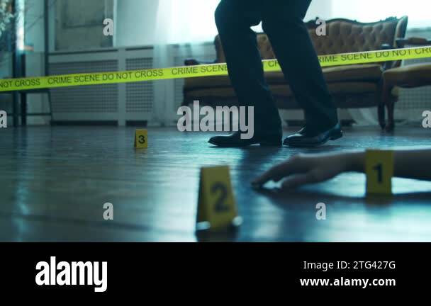 Detective Collecting Evidence in a Crime Scene. Forensic Specialists ...