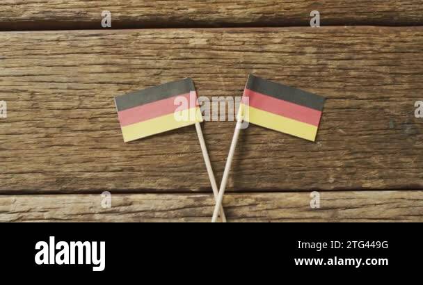 Video of flags of germany on wooden background. nationality, state ...