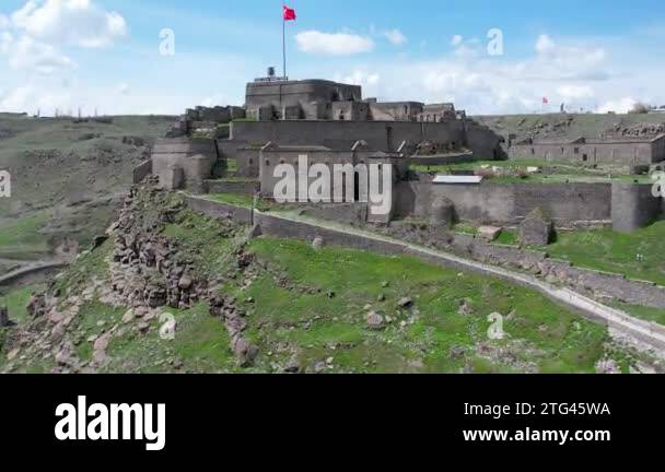 Ancient stone bridge across Kars River & Kars Castle - main tourist ...