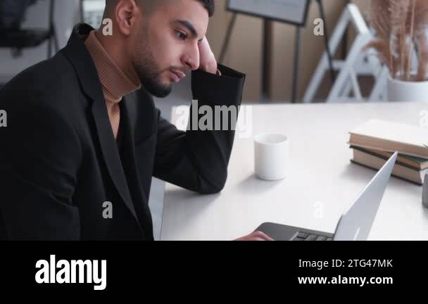 Online education. Searching man. Digital technology. Concentrated ...