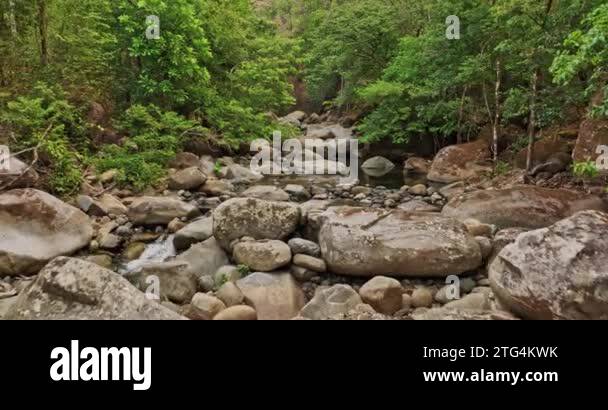 Caldera Panama Aerial v1 flyover the creek at jaguatta waterfall ...