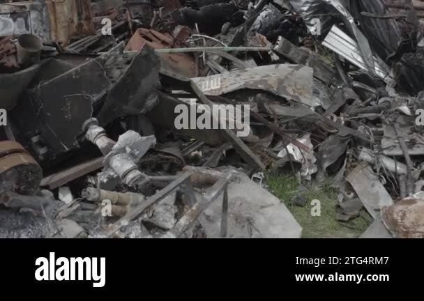 Destroyed military convoy. Burnt combat vehicles. Rusty tech ...