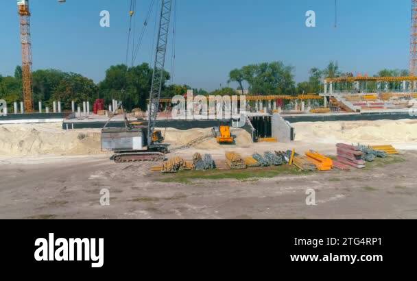 Construction process of a modern football stadium. Builders make ...