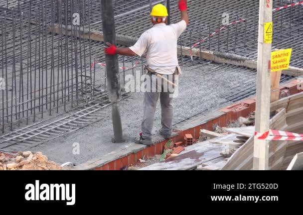 Heavy Construction Concrete Pour. Manufacture of a reinforced concrete ...