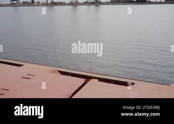 Yellow protective lead seal installed to safely lock cargo holds with ...