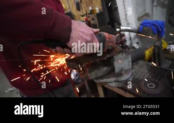 cutting metal and making custom parts for installing a car engine Stock ...