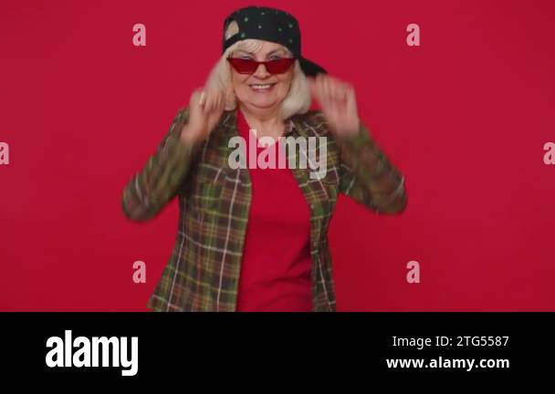 Funny woman listening music smiling dancing disco party music ...