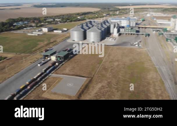 grain delivery. Grain storage. Grain trucks stand along the road in ...