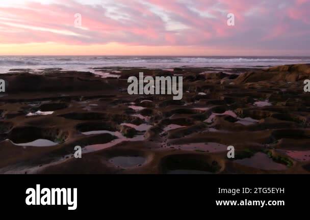 Eroded rock formation, tide pool shape in La Jolla, California coast ...