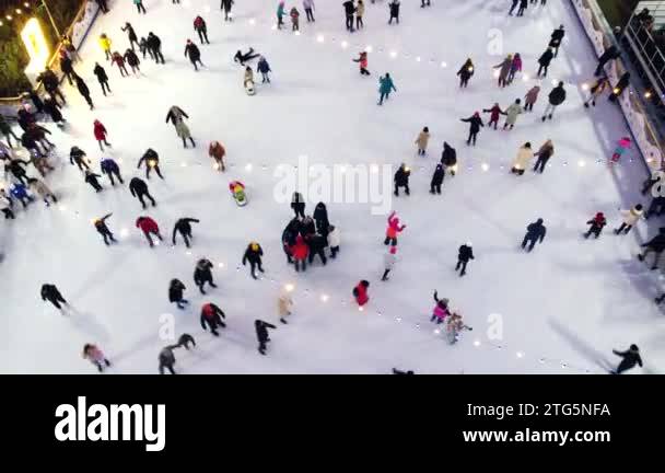Kiev, Ukraine, January 2, 2022:-Aerial Drone View many people skating ...