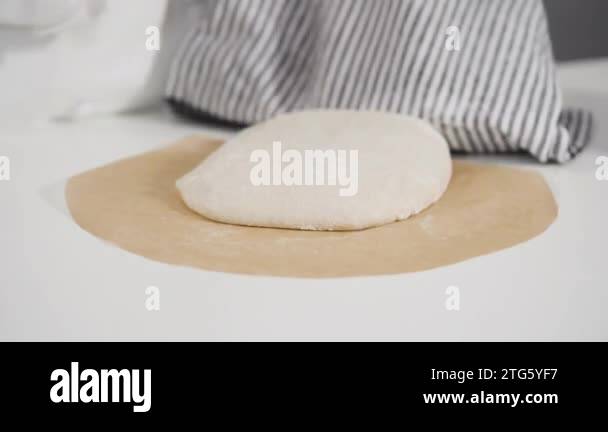 Process of cooking Cinnabon rolls. Ingredients on a white kitchen ...