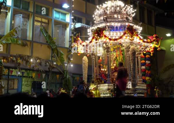 Georgetown, Penang, Malaysia - Jan 19 2022: Priest hold the oil lamp in ...
