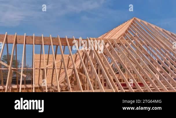 An aerial top view of stick built home under construction with wooden ...