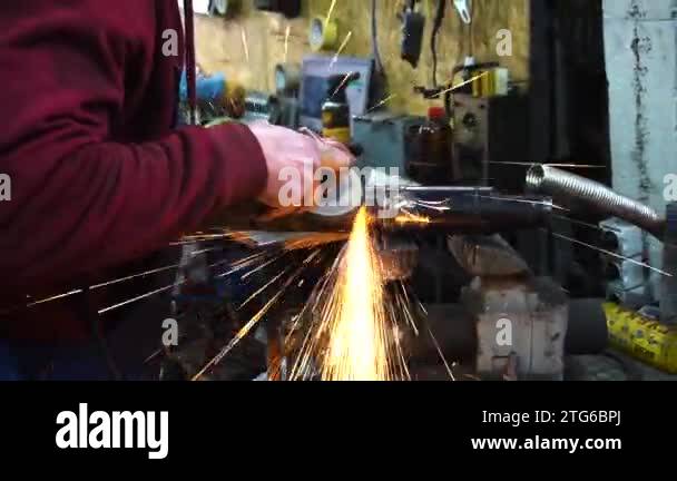 cutting metal and making custom parts for installing a car engine Stock ...