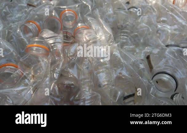 Plastic bottles collected in the sea and stacked for recycling ...