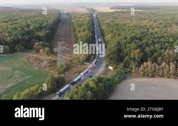 grain delivery. Grain storage. Grain trucks stand along the road in ...