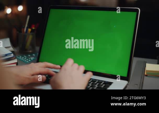 Student hands typing chromakey laptop at dark room closeup. Busy woman ...