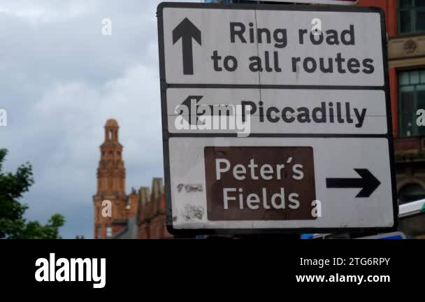 Close up of traffic and tourist direction sign or board showing way to ...