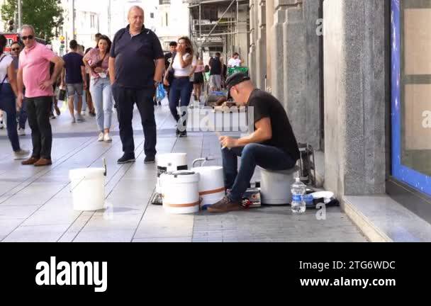 Busker bucket Stock Videos & Footage - HD and 4K Video Clips - Alamy