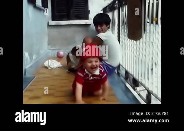trasquera, italy june 14 1980:little boy with dog and little girl ...