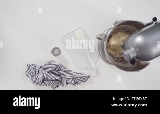 Process of cooking Cinnabon rolls. Ingredients on a white kitchen ...