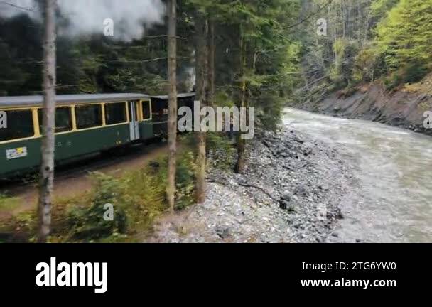 VISEU DE SUS, ROMANIA - MAY, 2022: Aerial drone view of moving steam ...