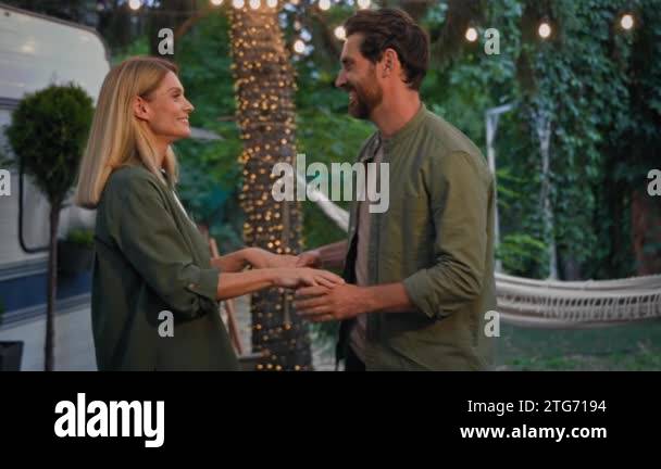 Caucasian married couple love dance together slow movement in camping ...