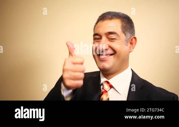 Businessman, thumbs up, gun and surrendering Stock Video Footage - Alamy