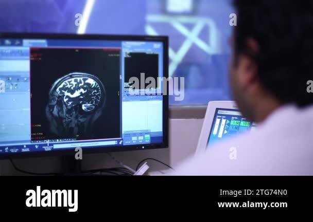 Brain imaging. Pictures of the brain scan on the monitor. MRI research ...