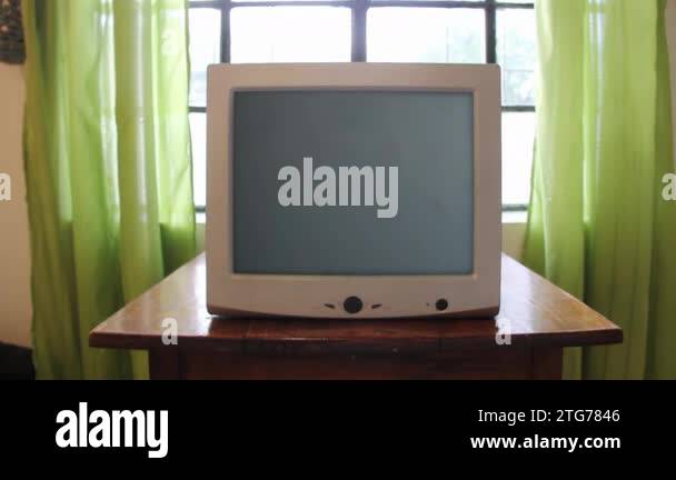 Computer Monitor Turning On Static Noise and Blue Screen. Close Up ...