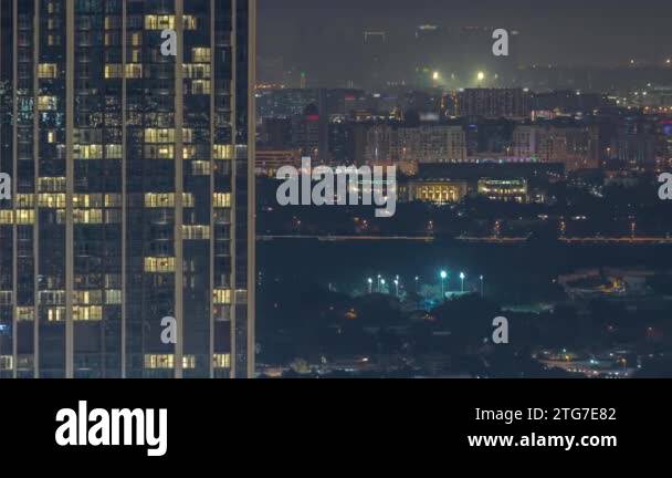 Buildings around Deira and creek district in Dubai night timelapse ...