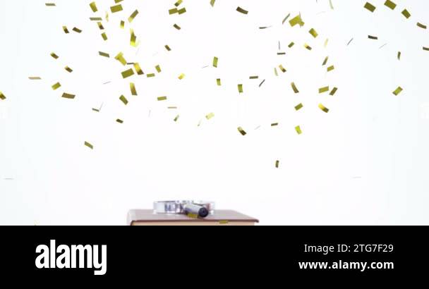 Animation of confetti falling over colour pencils and stack of books. international literacy day ...