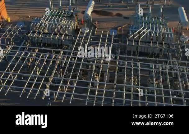 High voltage electric grid in the evening. Transmission power line and ...