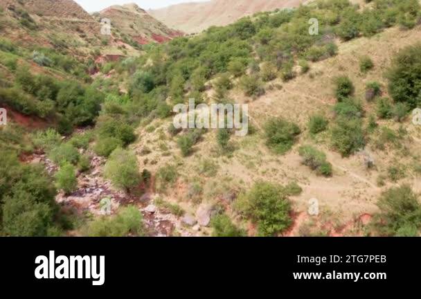 Canyon Akkum in the South Kazakhstan region. An ancient canyon with red ...