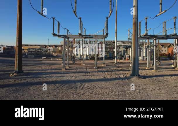 High voltage electric grid in the evening. Transmission power line and ...