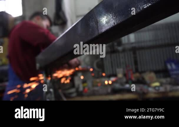 cutting metal and making custom parts for installing a car engine Stock ...