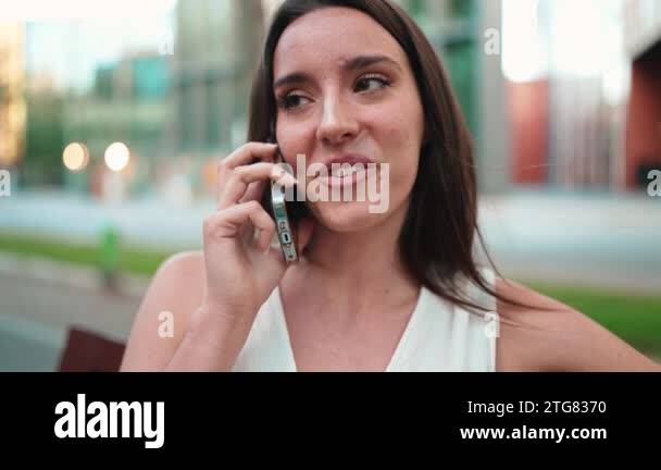 Clouse-up, beautiful woman with freckles and dark loose hair wearing ...