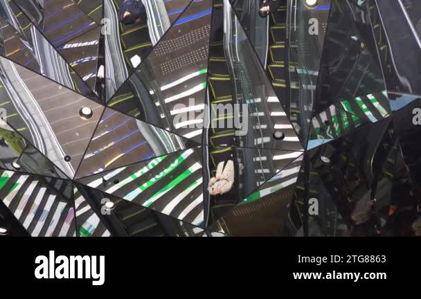 Tokyo, Japan-04 February, 2020: People reflections in the mirror of ...