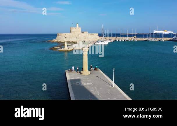 Mandraki port with deers statue, where The Colossus was standing and ...