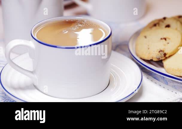 Dunk biscuit Stock Videos & Footage - HD and 4K Video Clips - Alamy