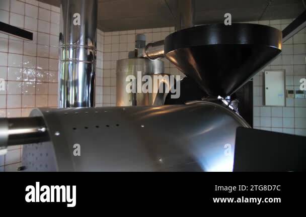 Wide shot of coffee roaster machine at the factory.Professional ...