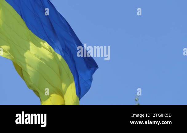 Highly detailed fabric texture flag of Ukraine. Slow motion of Ukraine ...