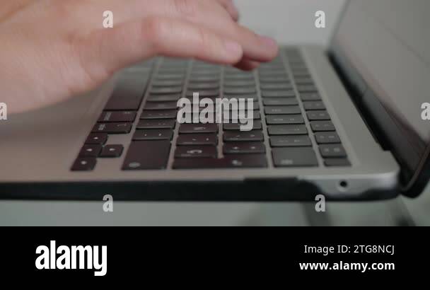 Woman uses laptop for typing article for new website at work. Hands of ...