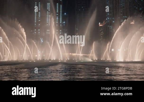 A video showing the Dubai fountain's water display in inward, outward ...