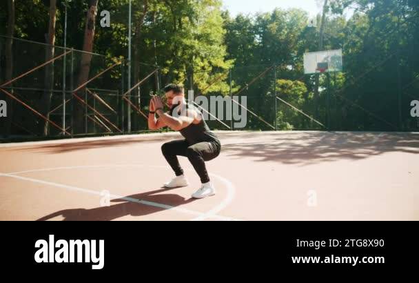 Healthy lifestyle and outdoor training. Fitness Man Doing Squat. Sport ...