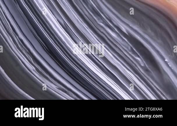 Fluid art background creation of colorful swirls and paint mixing ...