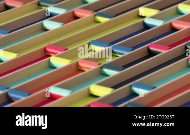 Colorful cylinders roll along lanes 3d looping animation. Conceptual ...