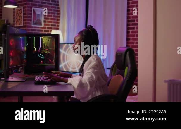 Woman streaming online first person shooter action game surprised after ...